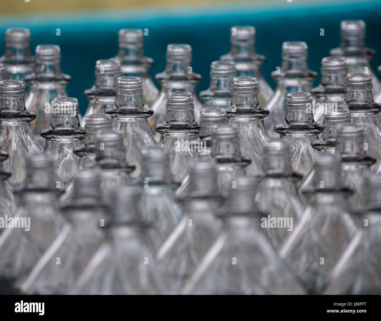 Bottles for the bottle game at a booth on the midway of a county fair ...