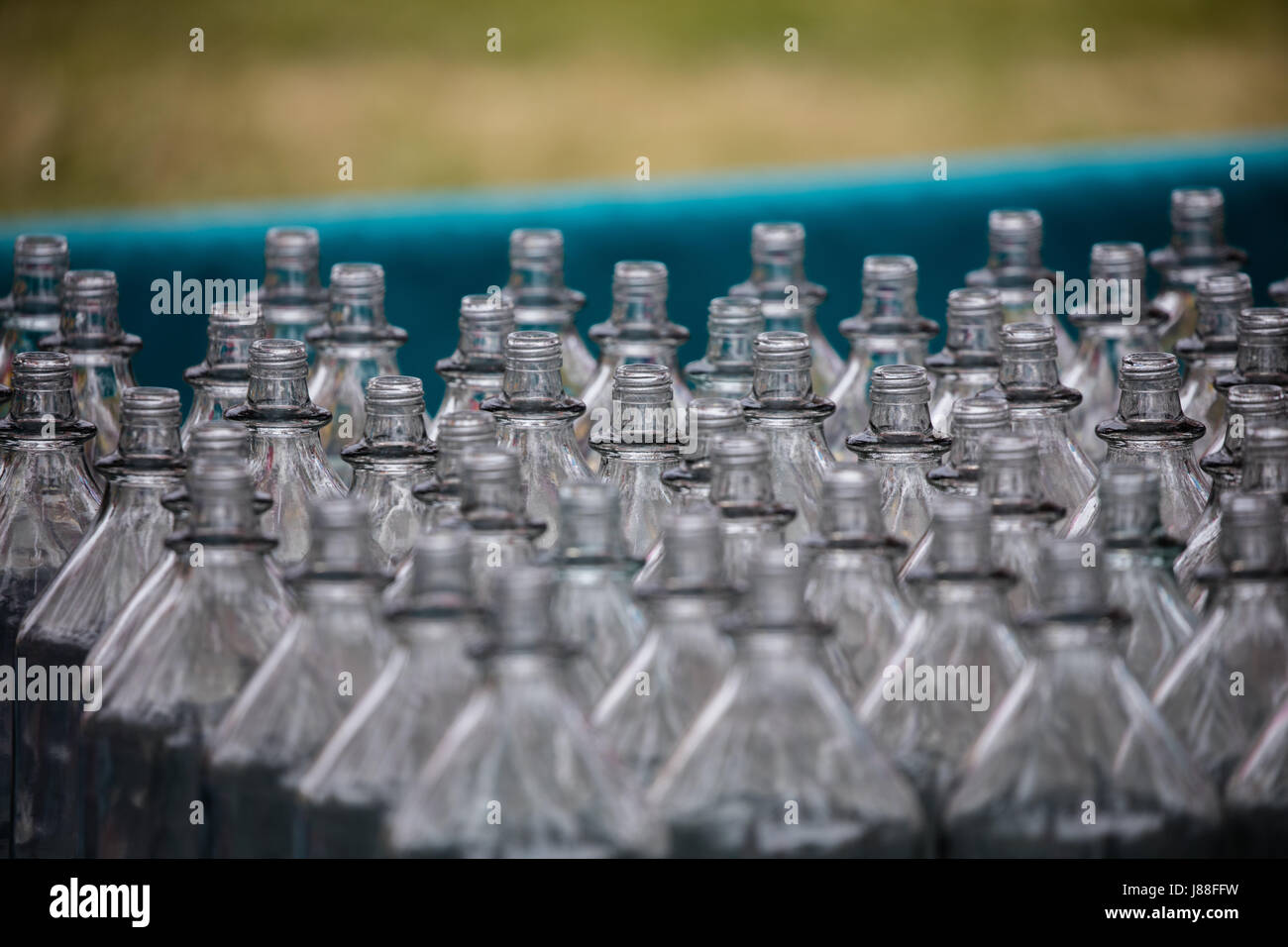 Bottles for the bottle game at a booth on the midway of a county fair ...