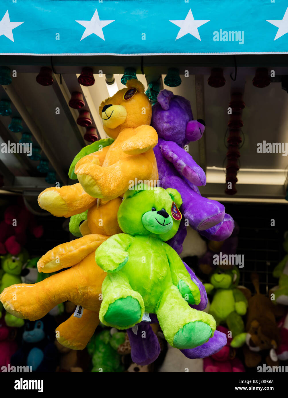 Stuffed animal toy prizes at the county fair Stock Photo - Alamy