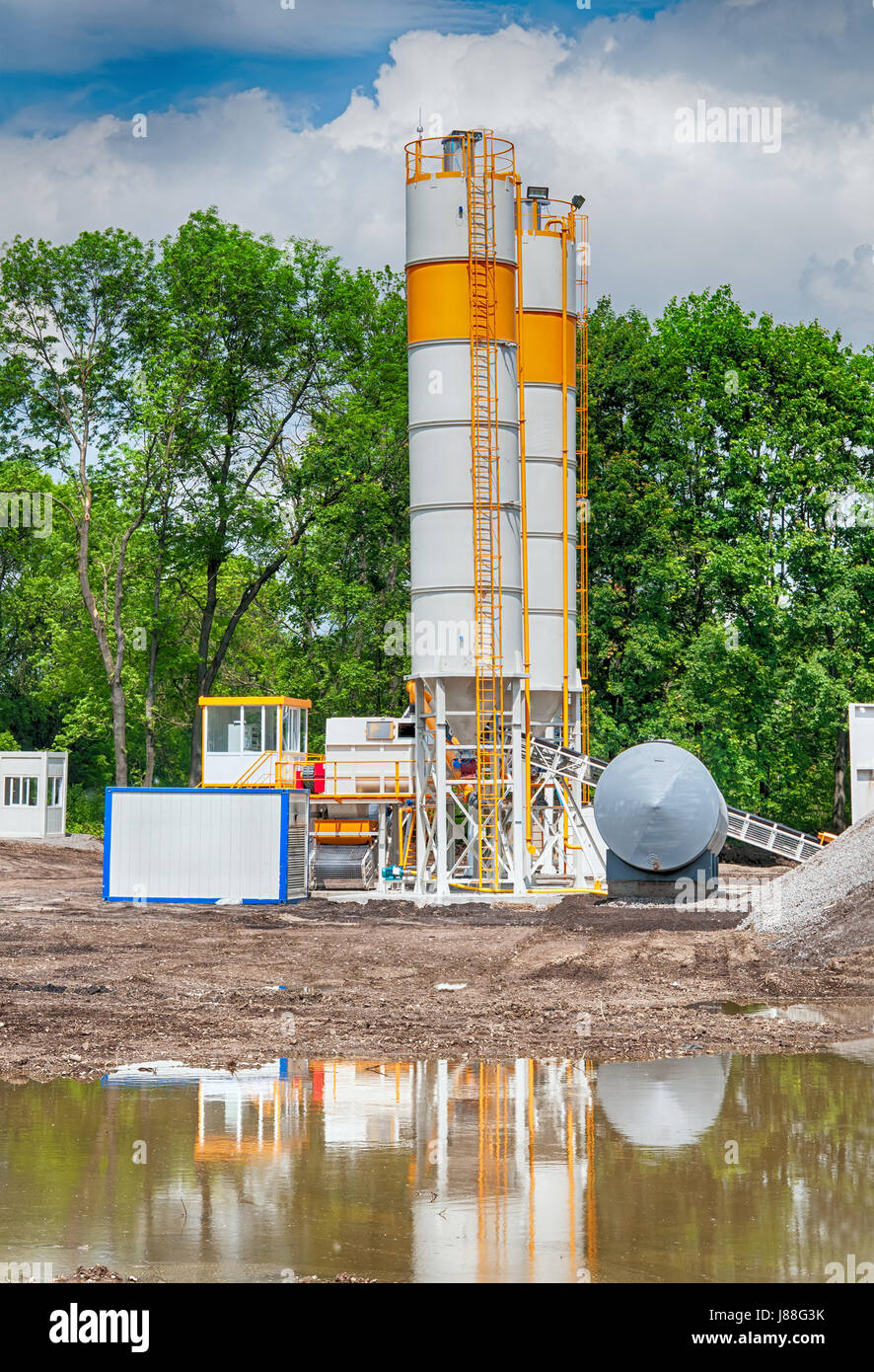 Concrete mixing silo, site construction facilities Stock Photo - Alamy