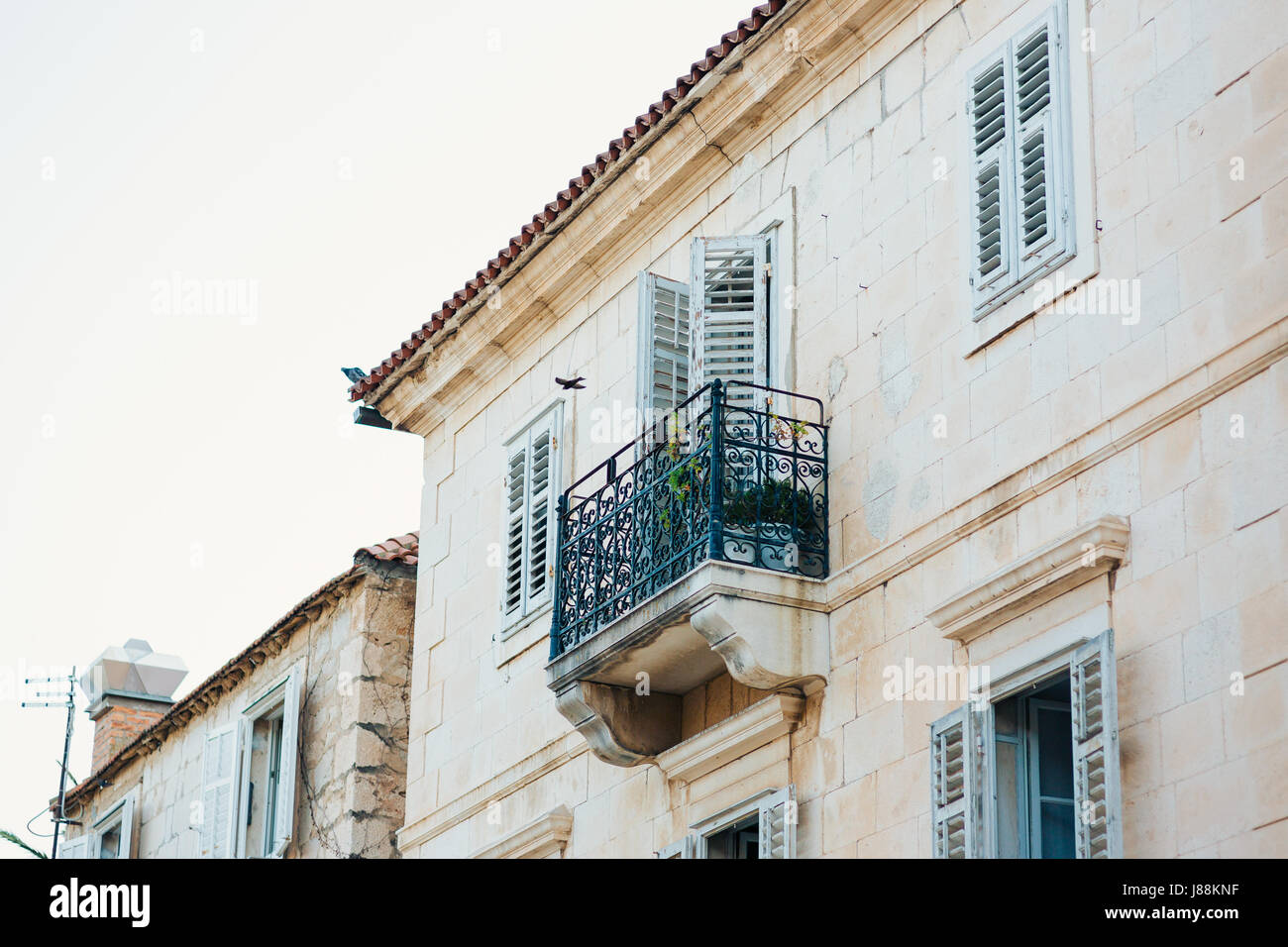 Forged balcony in an old house. Balkan architecture, Montenegro ...