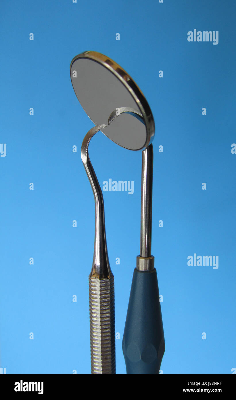 dental mirror and scaler Stock Photo - Alamy
