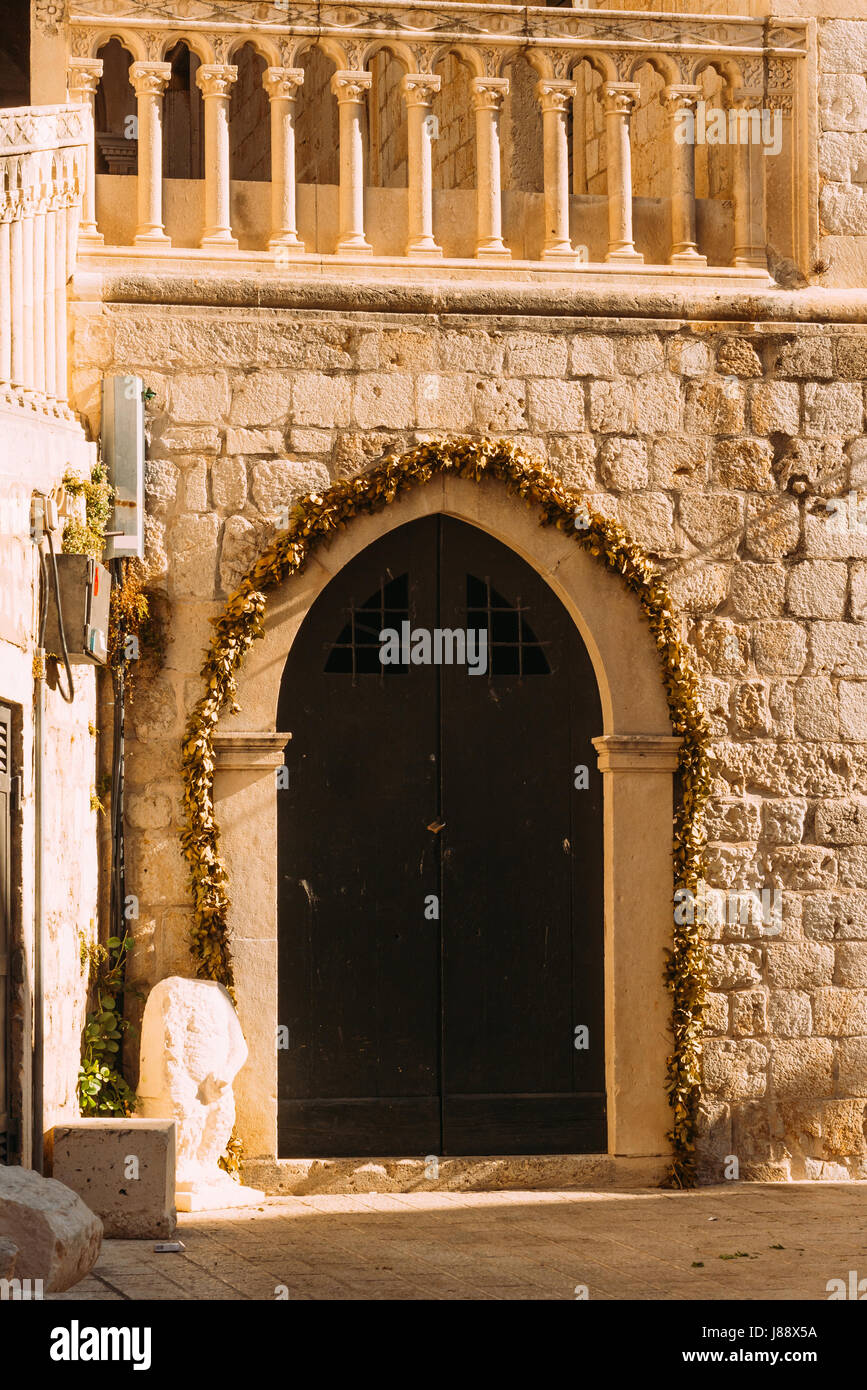 Old black doors. Wood texture. Texture of metal. Old shabby, irradiated ...