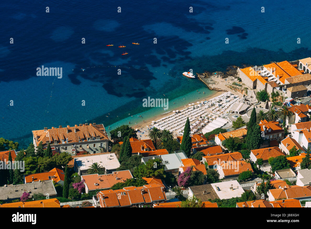 Kayaks at sea. Tourist kayaking in the sea near Dubrovnik, Croatia ...