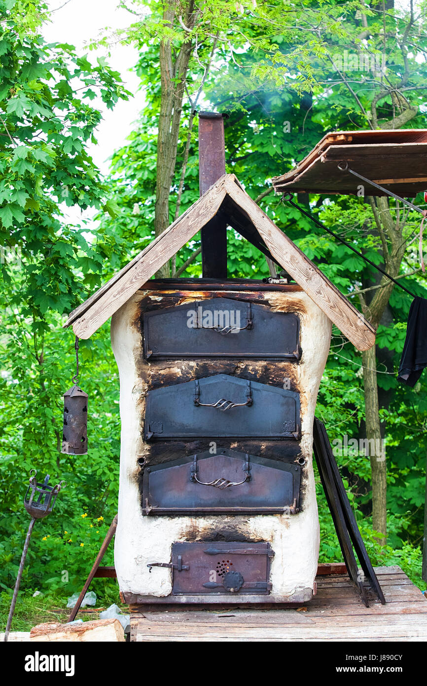 Old clay oven on traditional campfire in medieval knights camp Stock ...