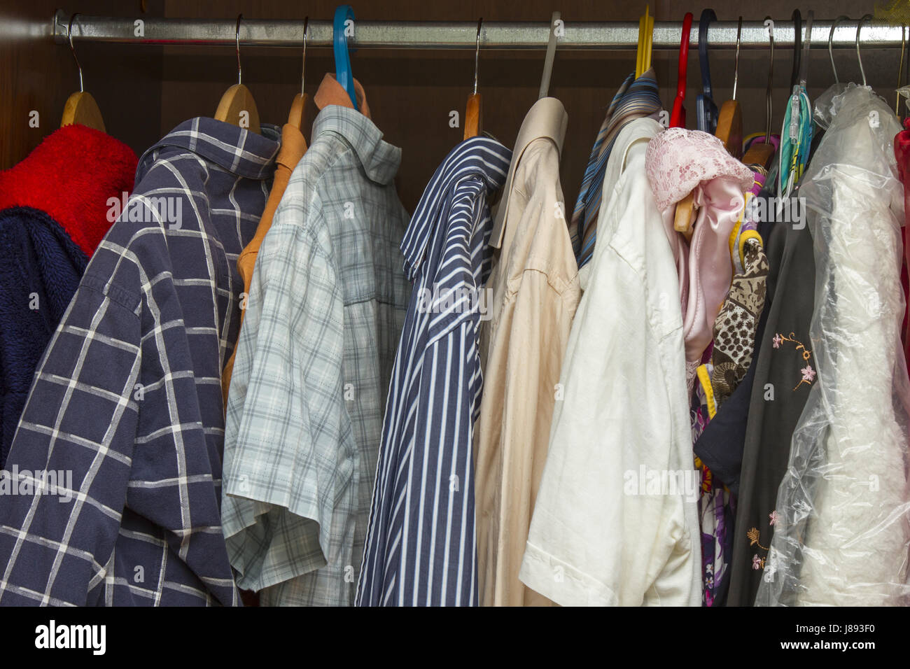 Clothes in the closet Stock Photo - Alamy
