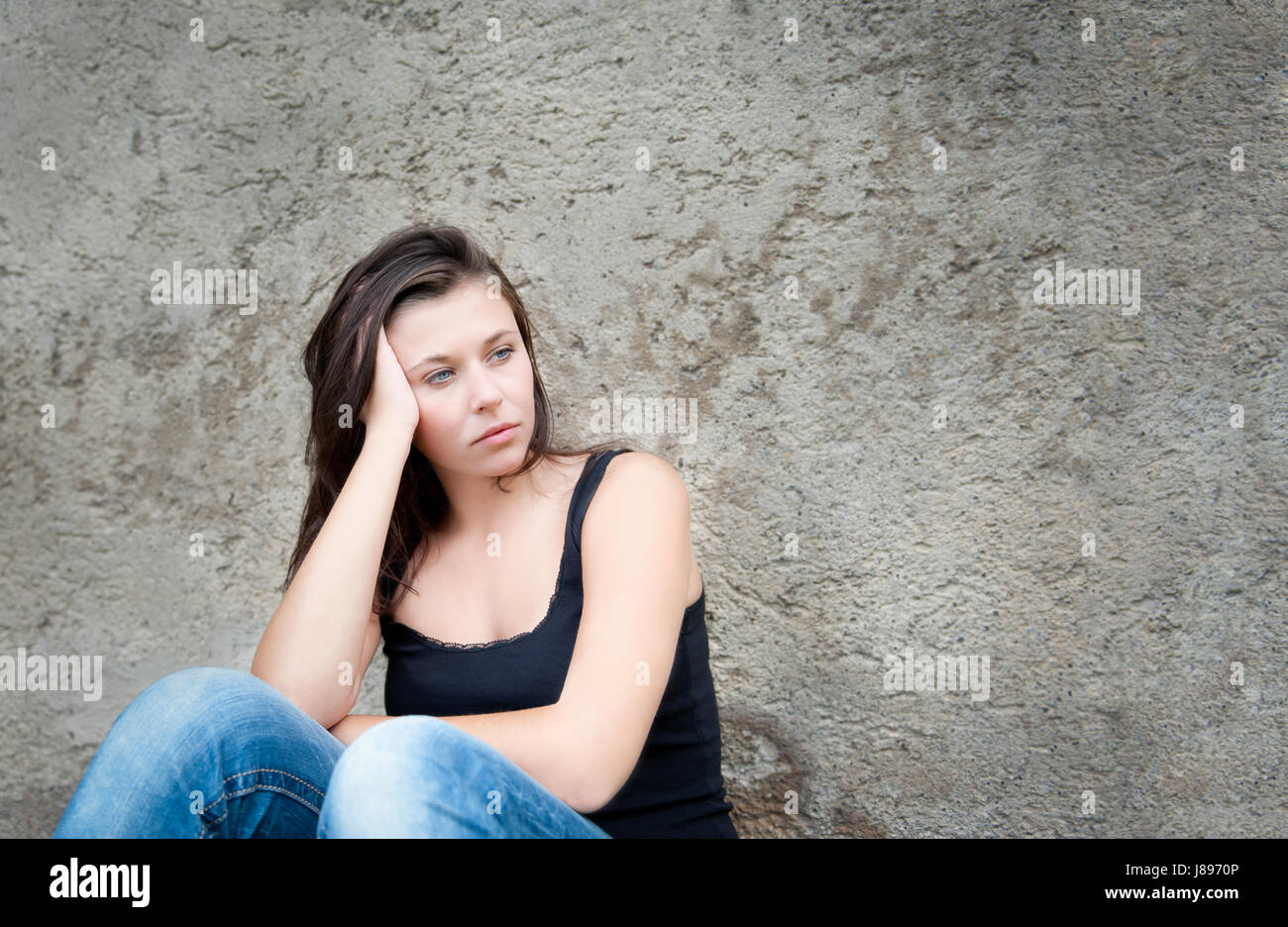 portrait of a pensive,sad girl Stock Photo - Alamy