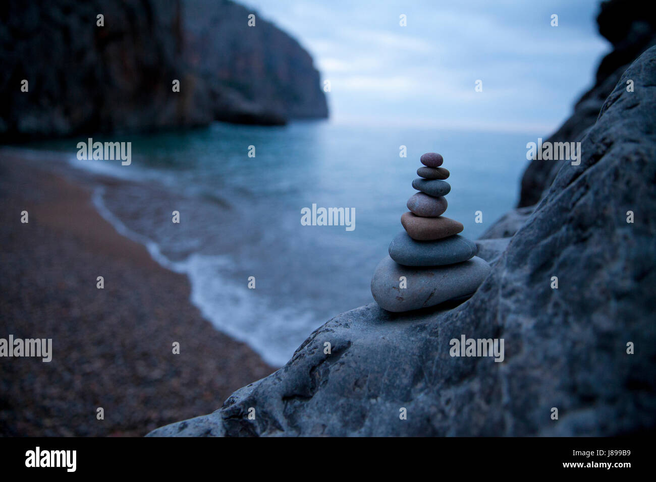 ROCKS ON THE BEACH Stock Photo - Alamy