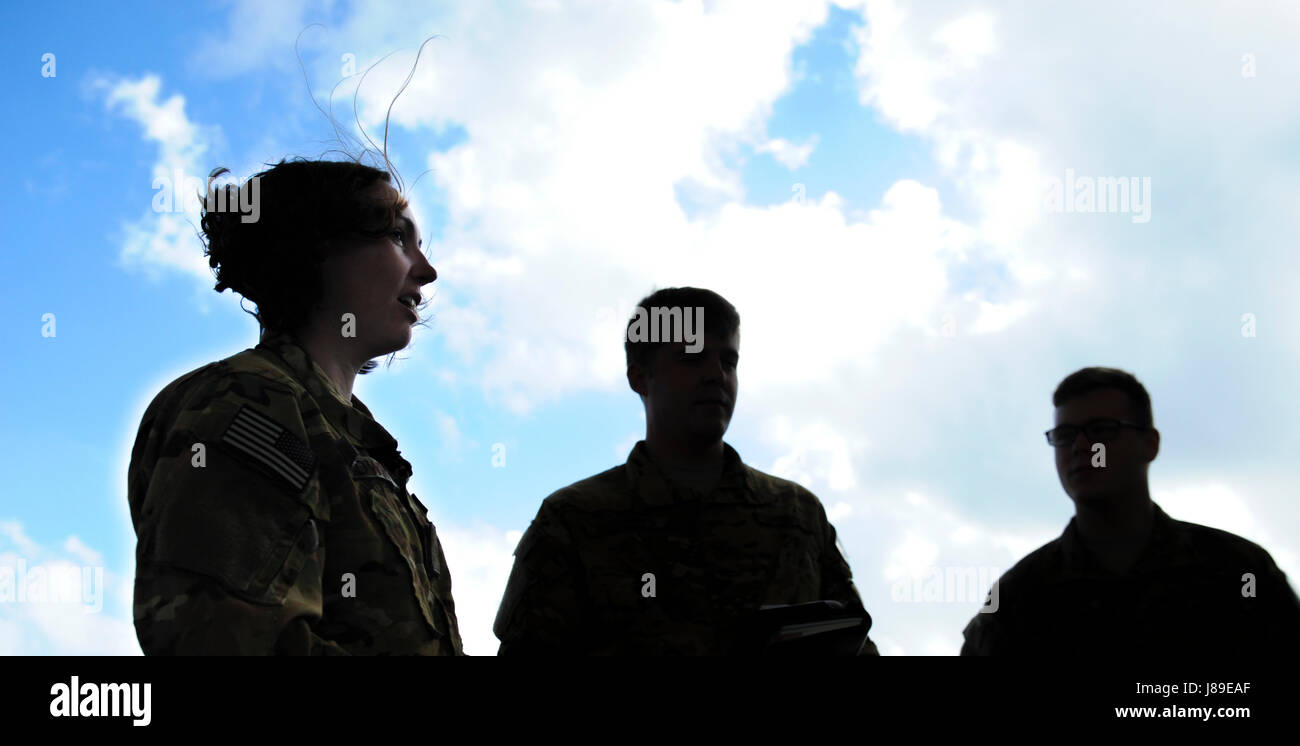 Members of the 25th Intelligence Squadron perform various tasks at ...