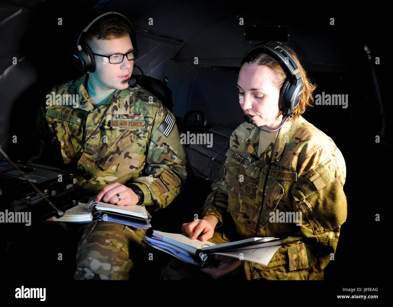 Members of the 25th Intelligence Squadron perform various tasks at ...