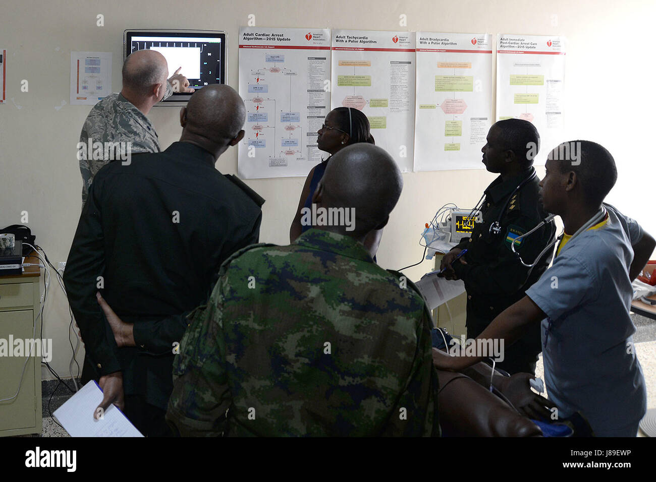 U.S. Air Force Lt. Col. Glenn Burns explains the use of the touchscreen ...