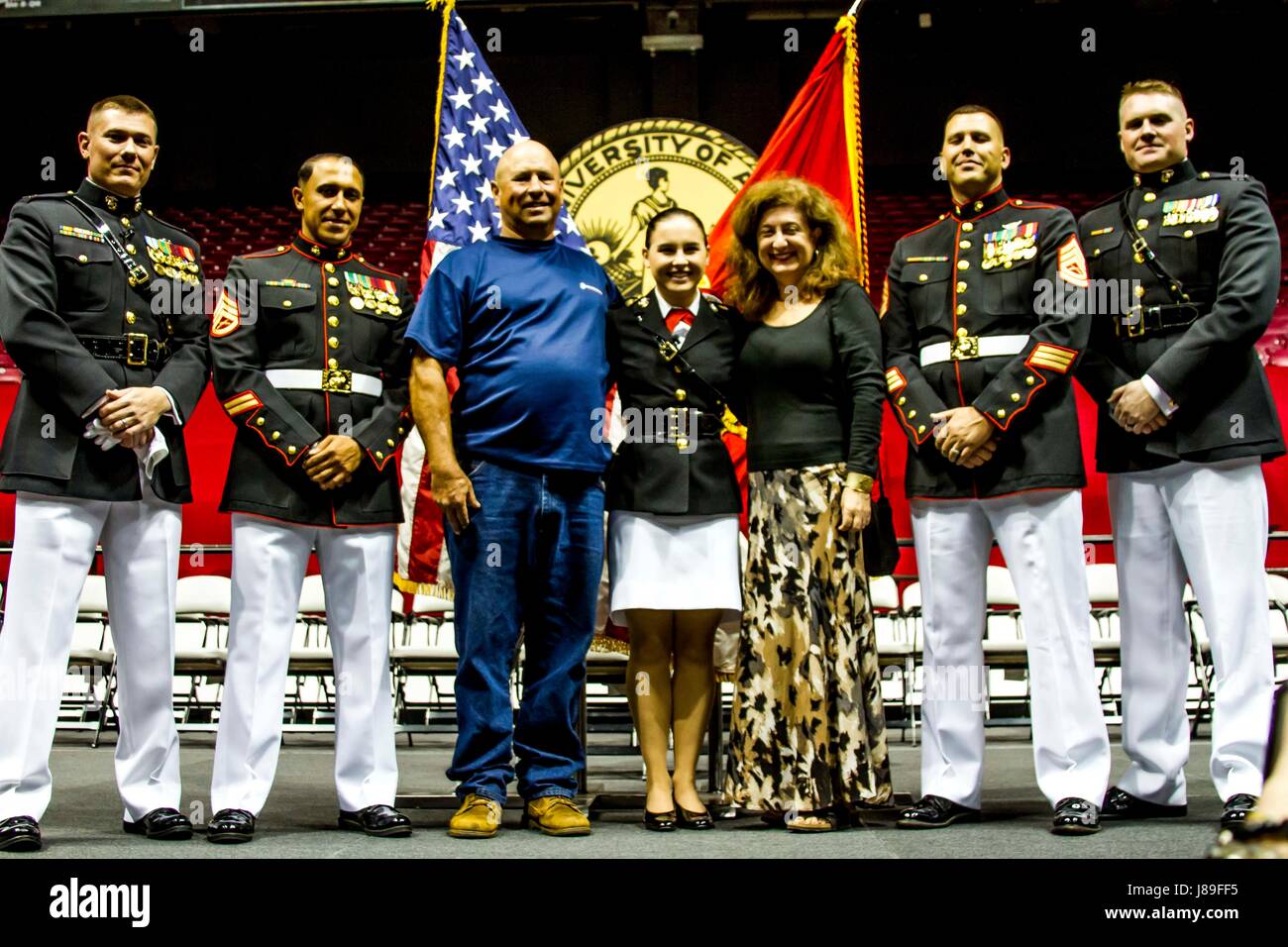 Second Lieutenant Mary Sanders poses with Marines with the officer ...