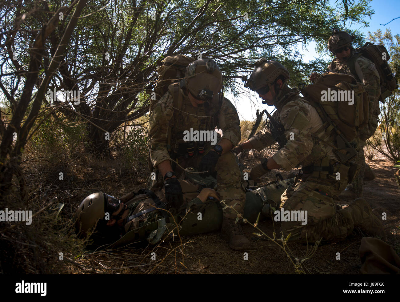 U.S. Air Force pararescuemen with the 58th Rescue Squadron prepare U.S ...