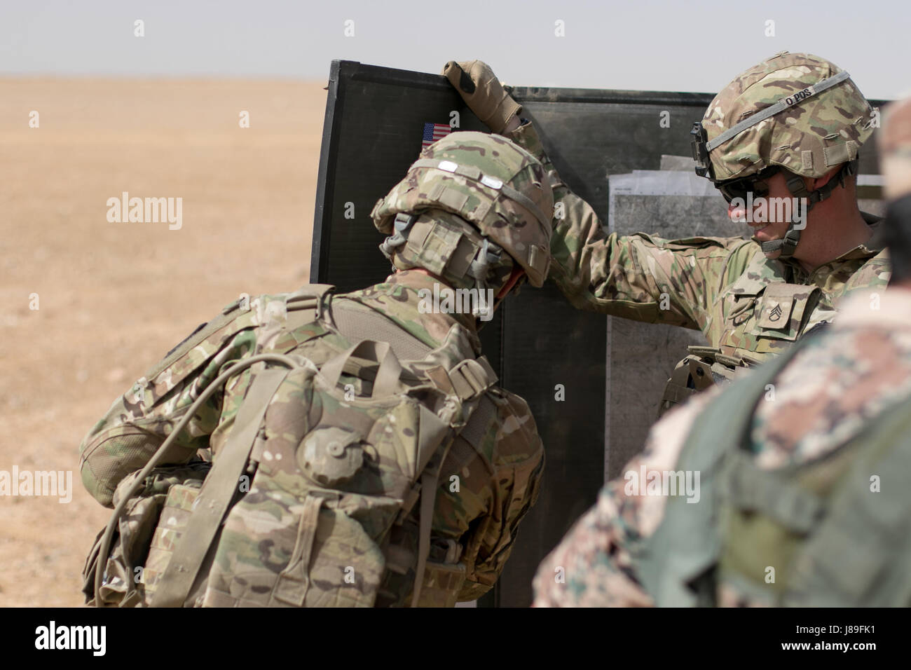 Sgt. Clark Rose, battery fire direct center chief and Staff Sgt. Justin ...