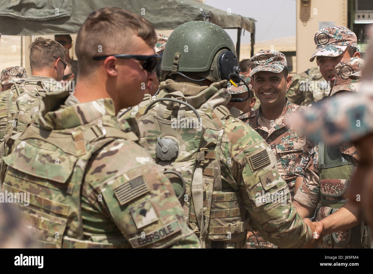 Spc. Evan Ebersole, gunner and Sgt. Lenin Godinet, launcher chief ...