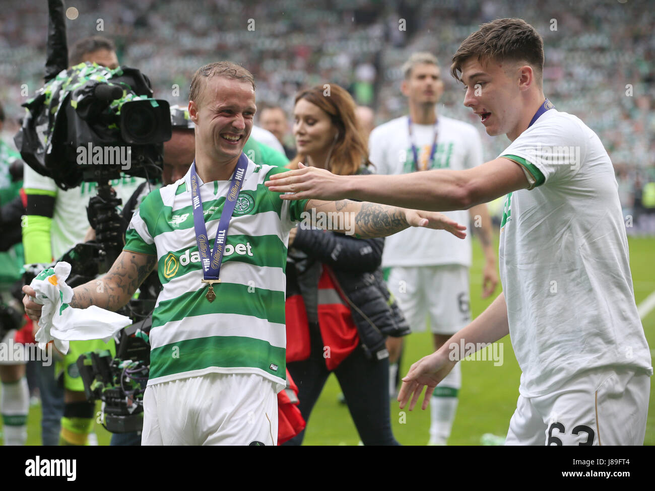 Celtic's Leigh Griffiths and Kieran Tierney (right) celebrate winning ...
