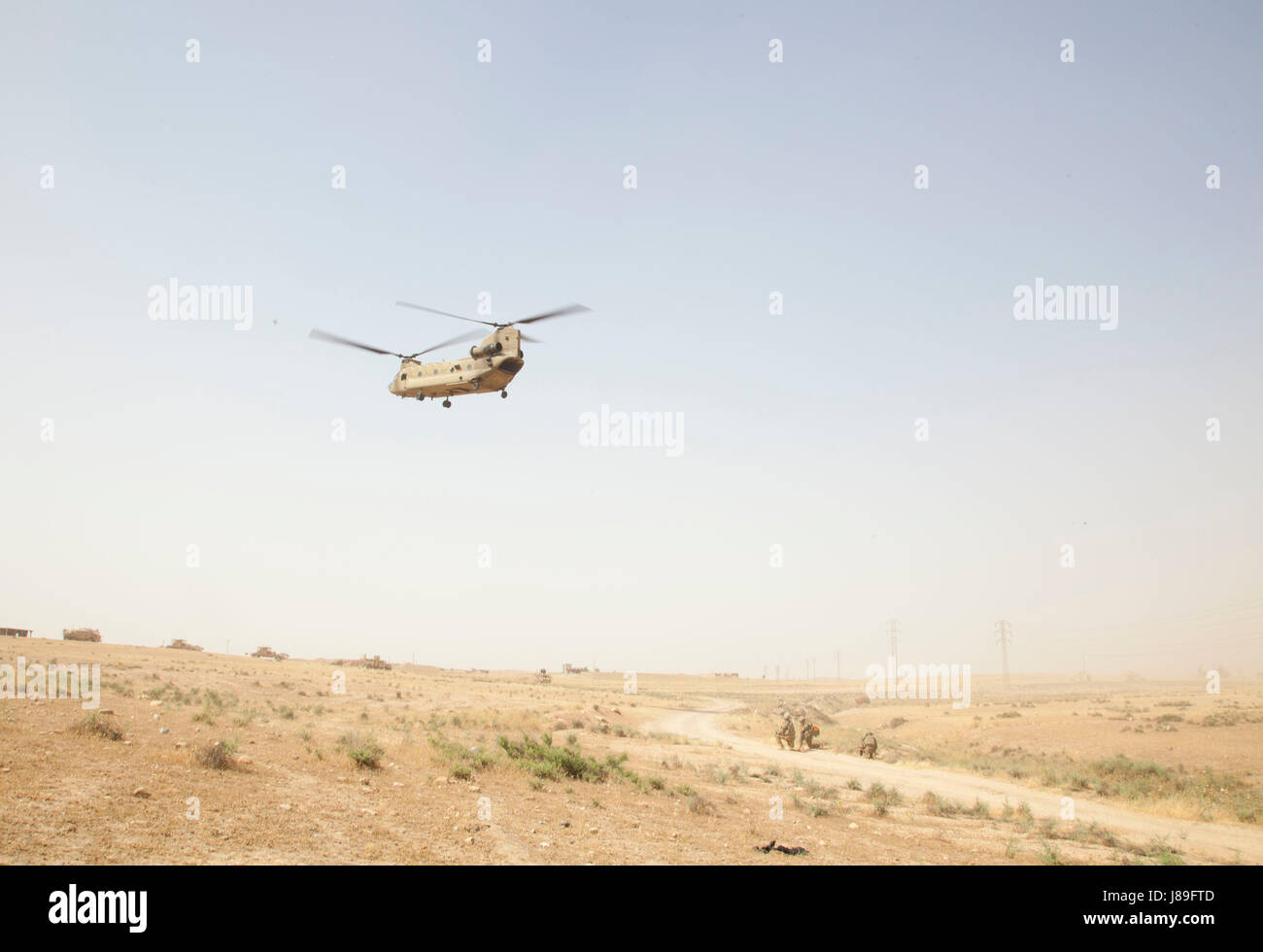 A U.S. Army CH-47 Chinook carrying visitors to the As-Salamiyah Water ...