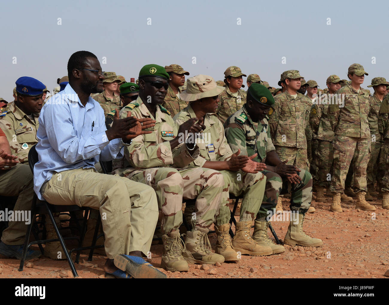 Leaders from the Forces Armées Nigeriennes applaud during the 724th ...