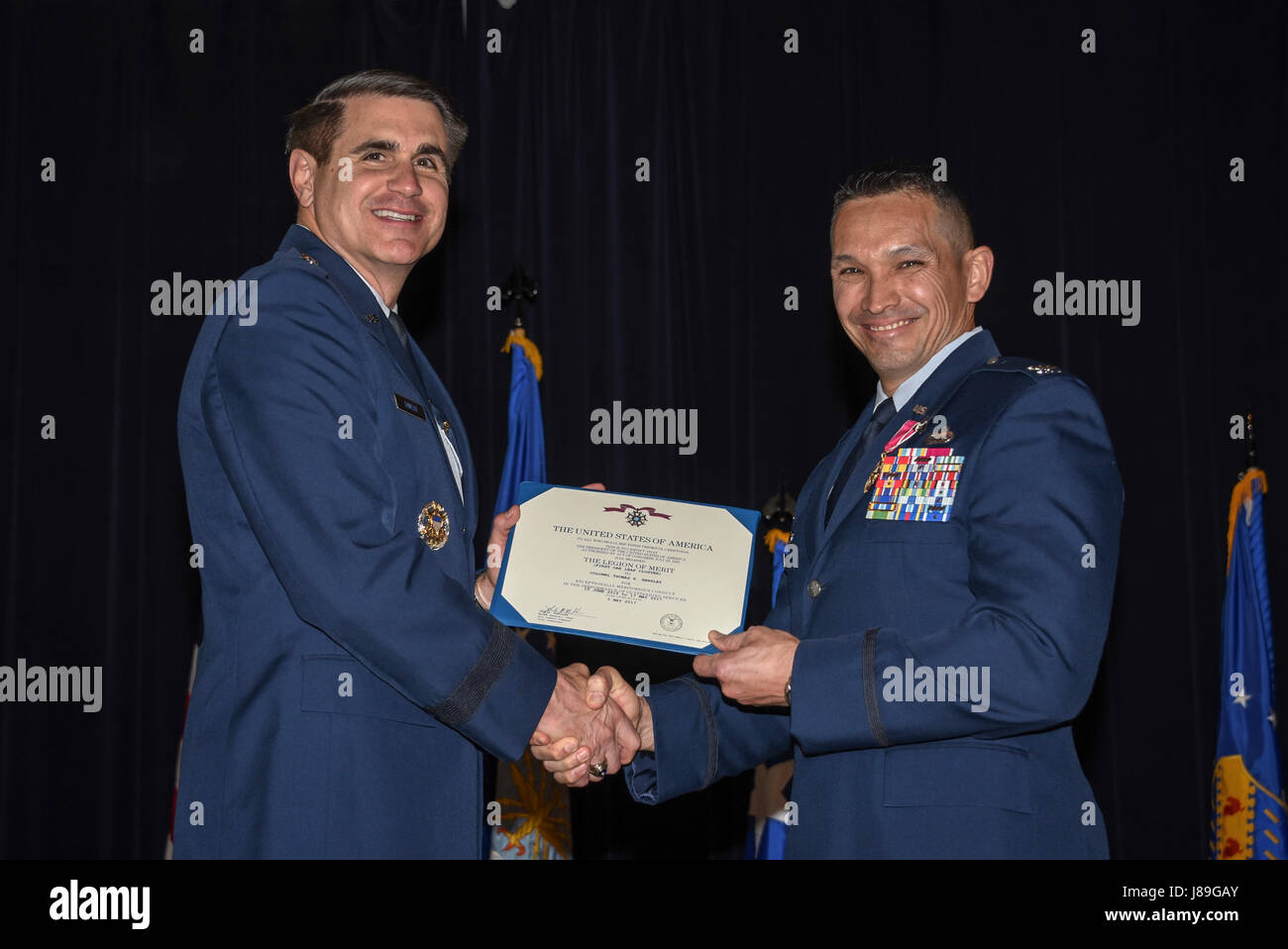 Maj. Gen. B.J. Shwedo, Commander of 25th Air Force, presents the Legion ...