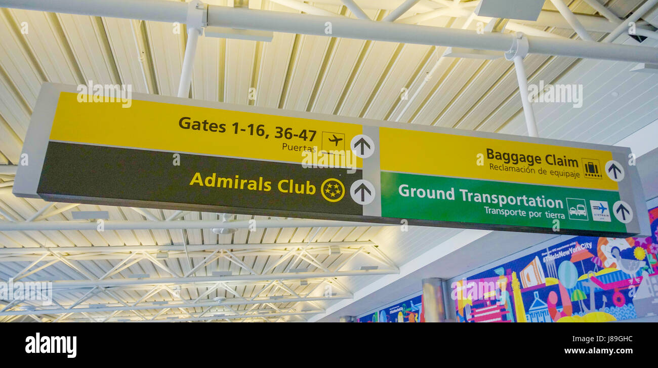Direction signs at the airport for gates and baggage claim DALLAS ...