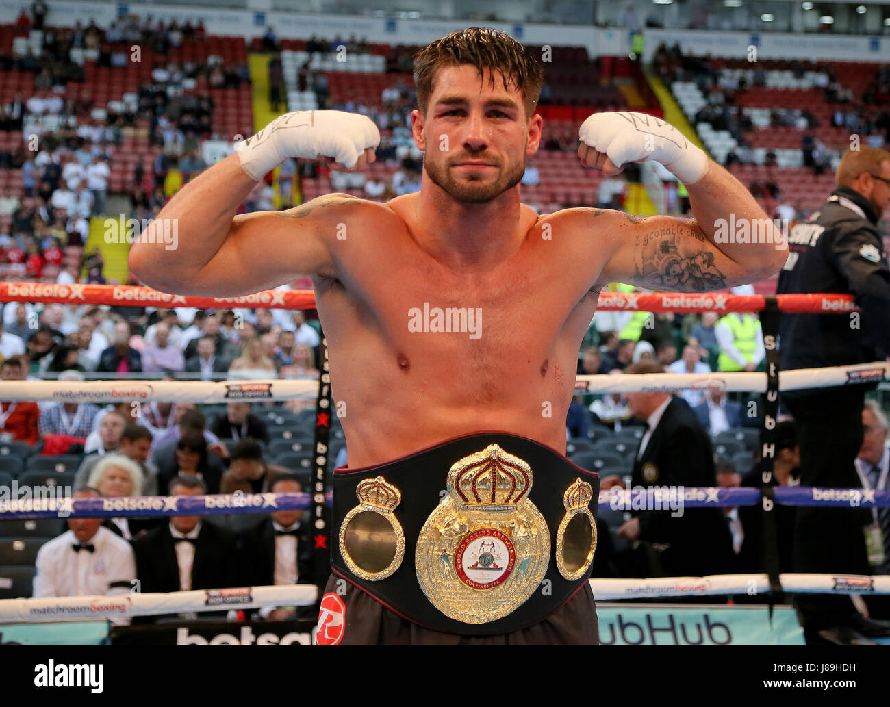 Jamie Cox celebrates beating Lewis Taylor during their WBA ...