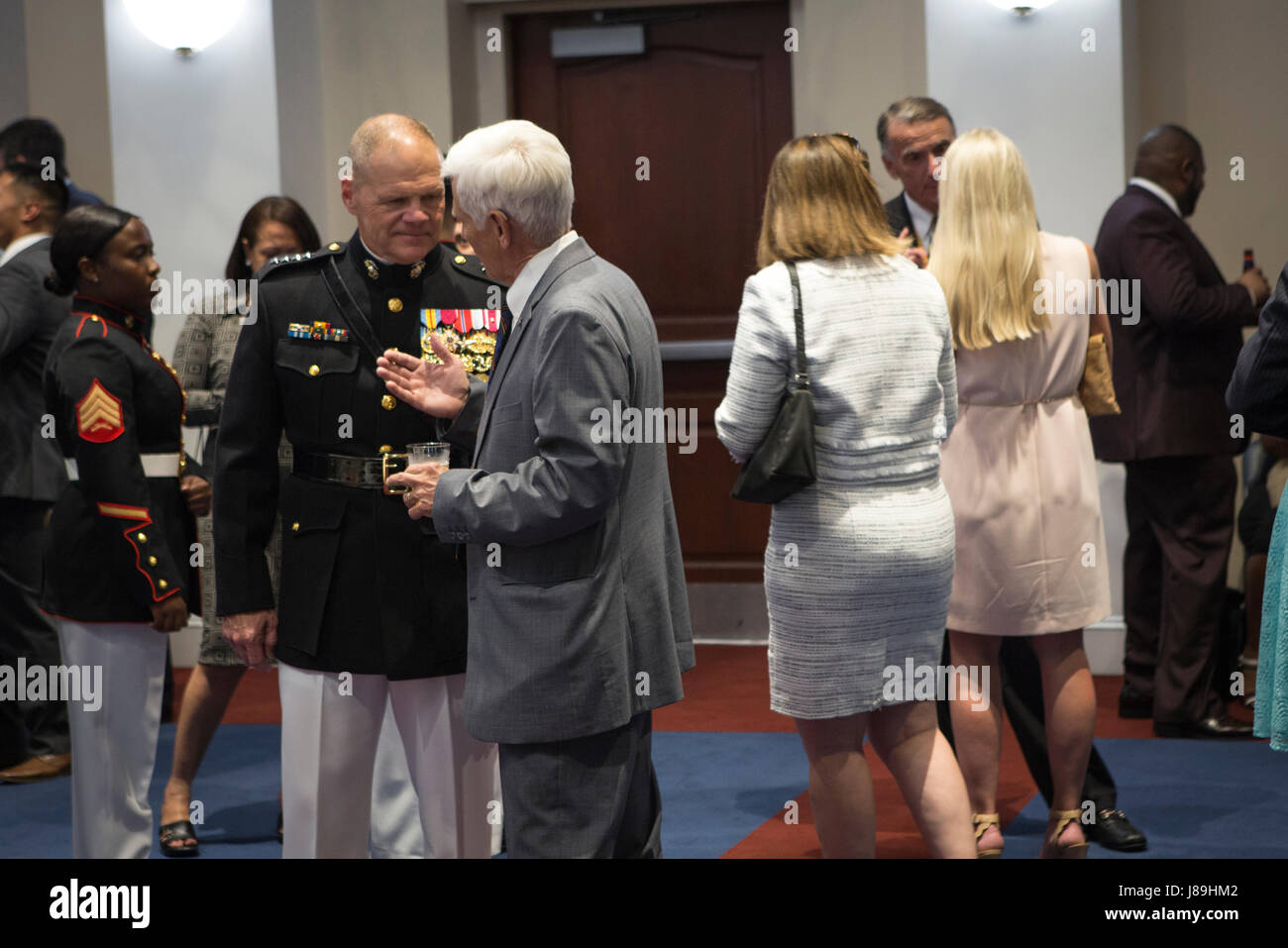 Commandant of the Marine Corps Gen. Robert B. Neller speaks with a ...