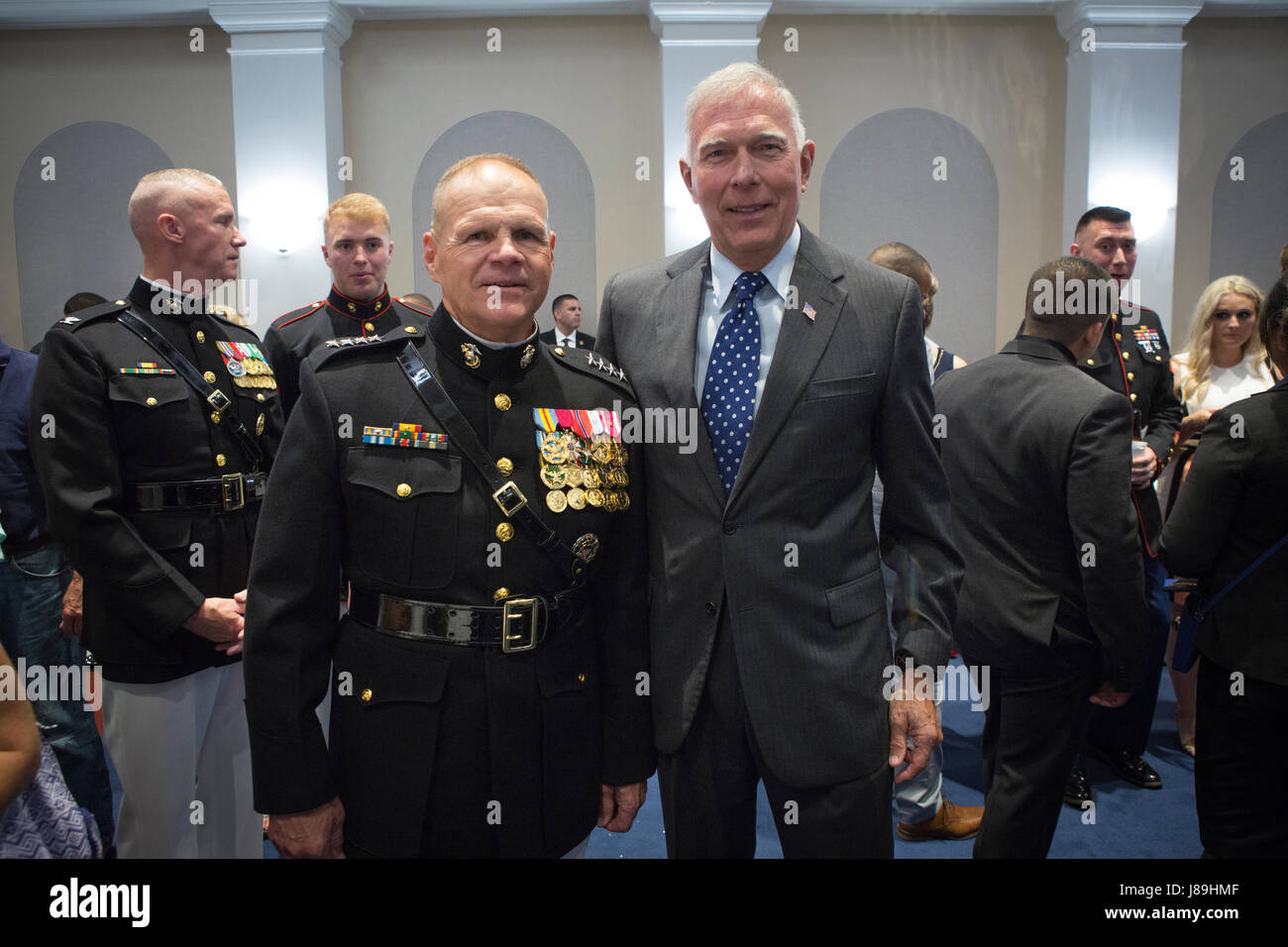 Commandant of the Marine Corps Gen. Robert B. Neller, left, poses for a ...