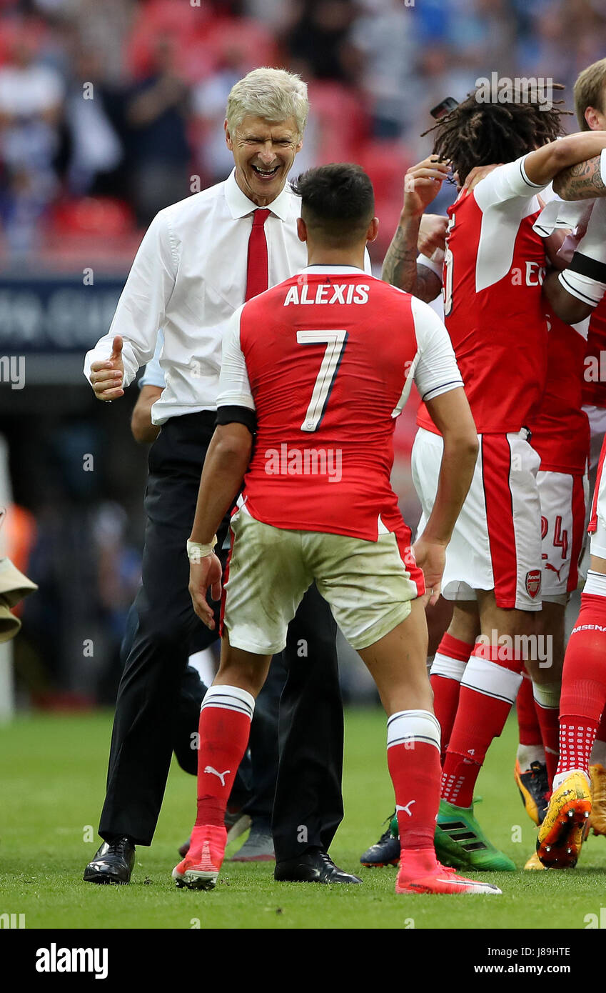 Arsenals alexis sanchez celebrates after hi-res stock photography and ...