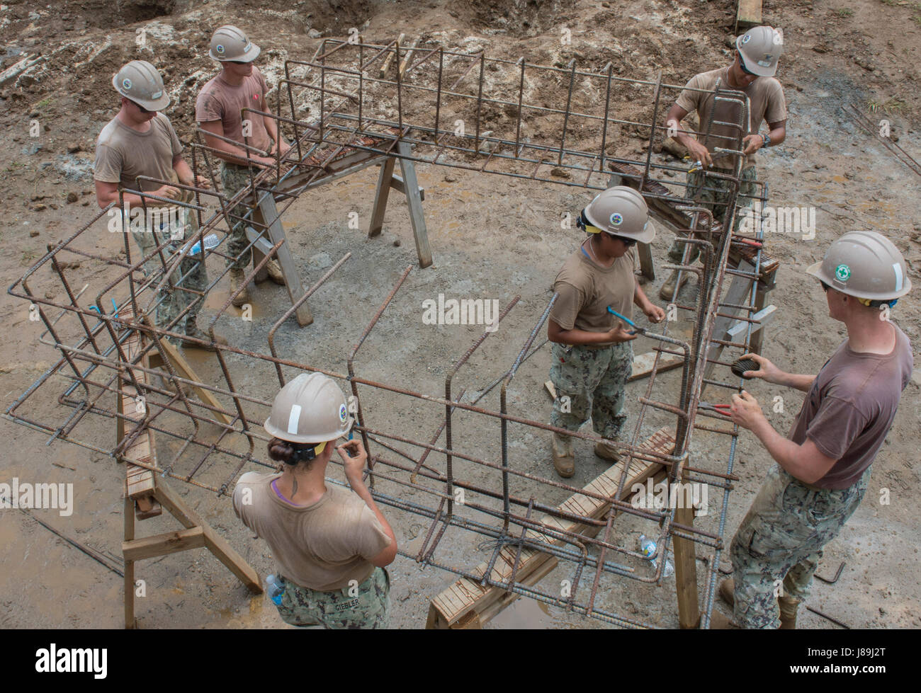 Sailors assigned to Naval Mobile Construction Battalion (NMCB) 1 build ...