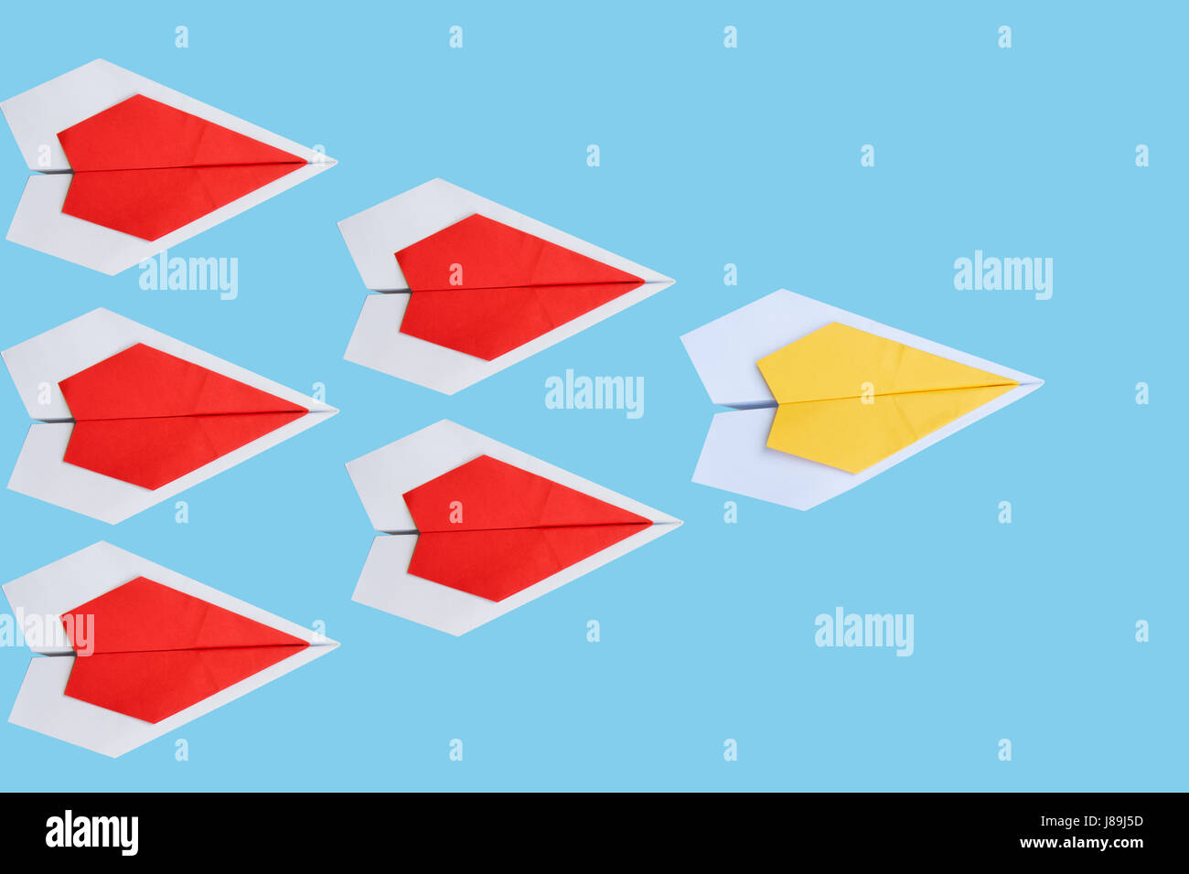 paper yellow airplane as a leader among red airplane , leadership ...