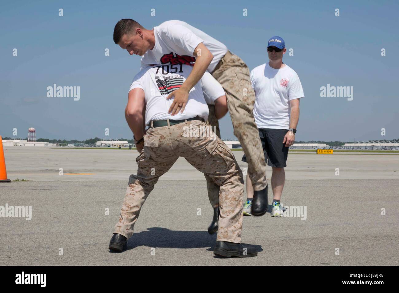 U.S. Marine Corps Cpl. Austin Fletcher, bottom, and Lance Cpl. Hunter ...