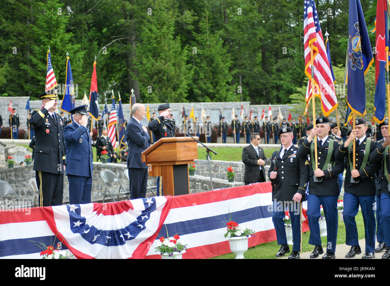 A 28th Infantry Division color guard passes the U.S., Pennsylvania and ...