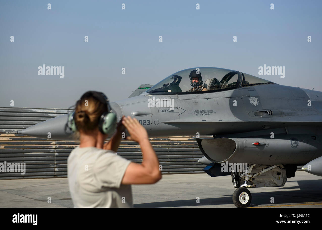 Air Force personnel conduct aircraft marshaling and flight operations ...