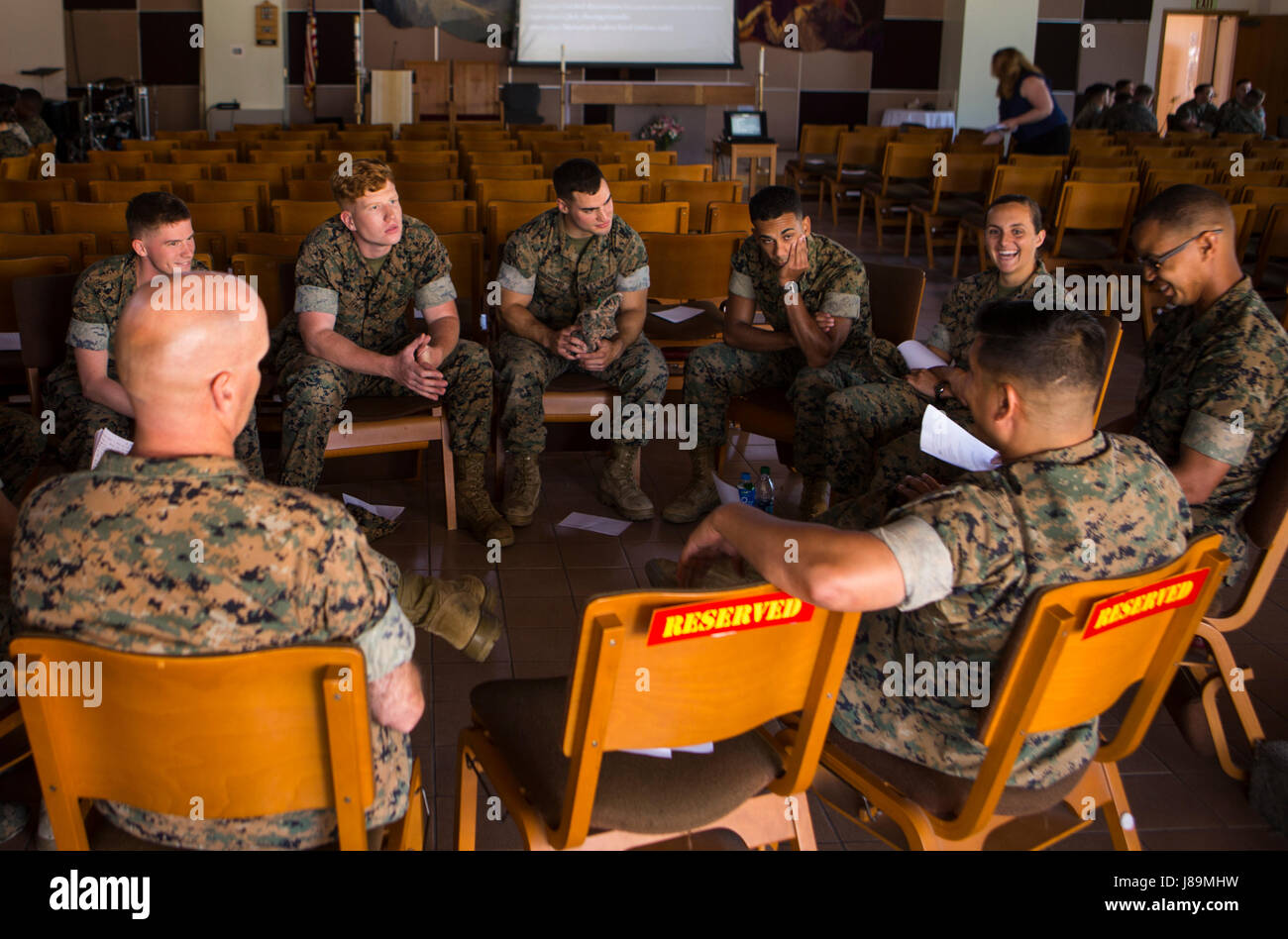 Marines with I Marine Expeditionary Force hold a group discussion about ...