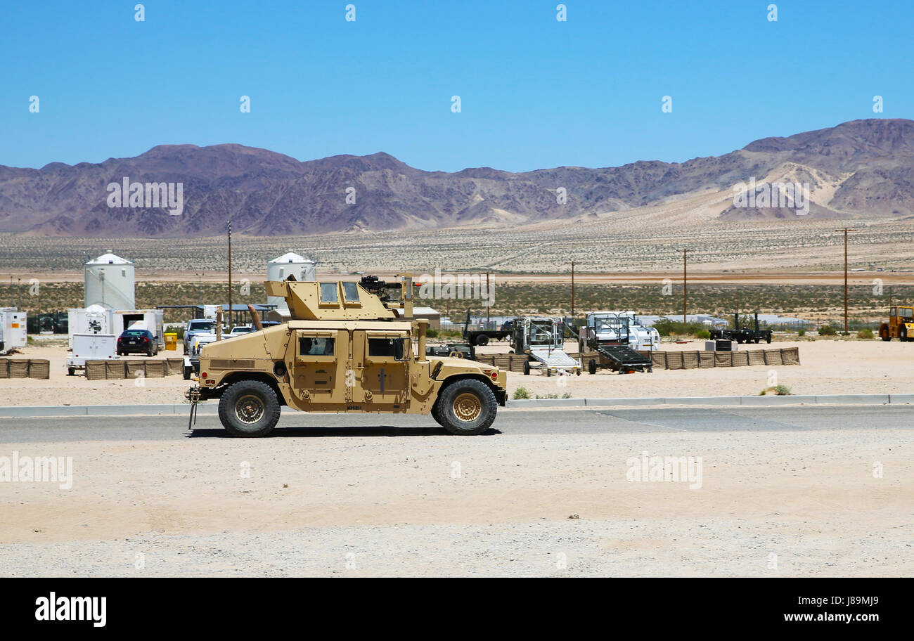 Marines with Marine Wing Support Squadron (MWSS) 373 conduct an area ...