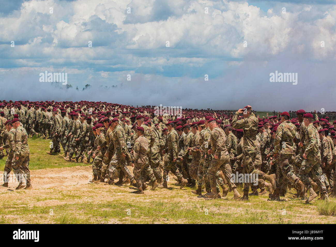 Paratroopers of the 82nd Airborne Division perform in a mass formation ...