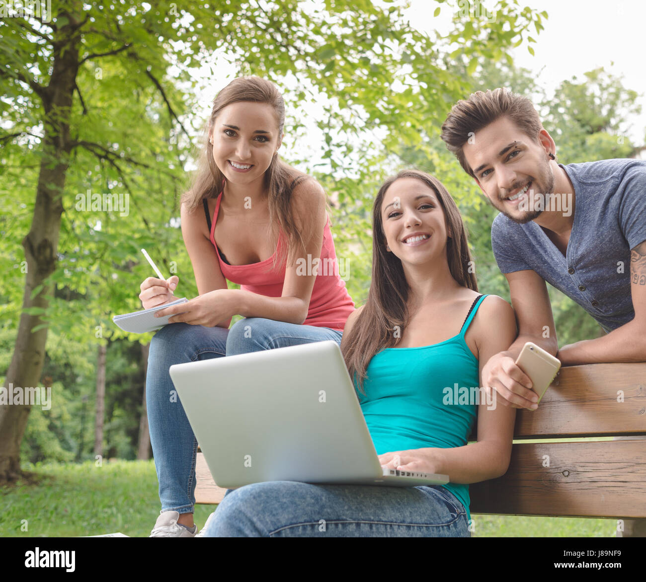 Leaning on a bench hi-res stock photography and images - Alamy