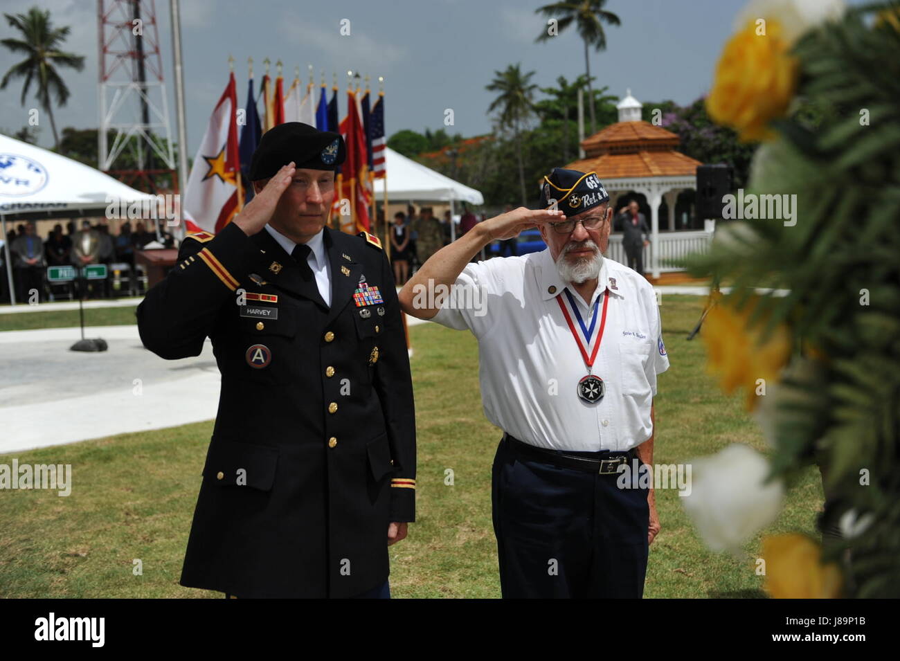 Col. Michael T. Harvey, Fort Buchanan Garrison Commander, and Javier ...