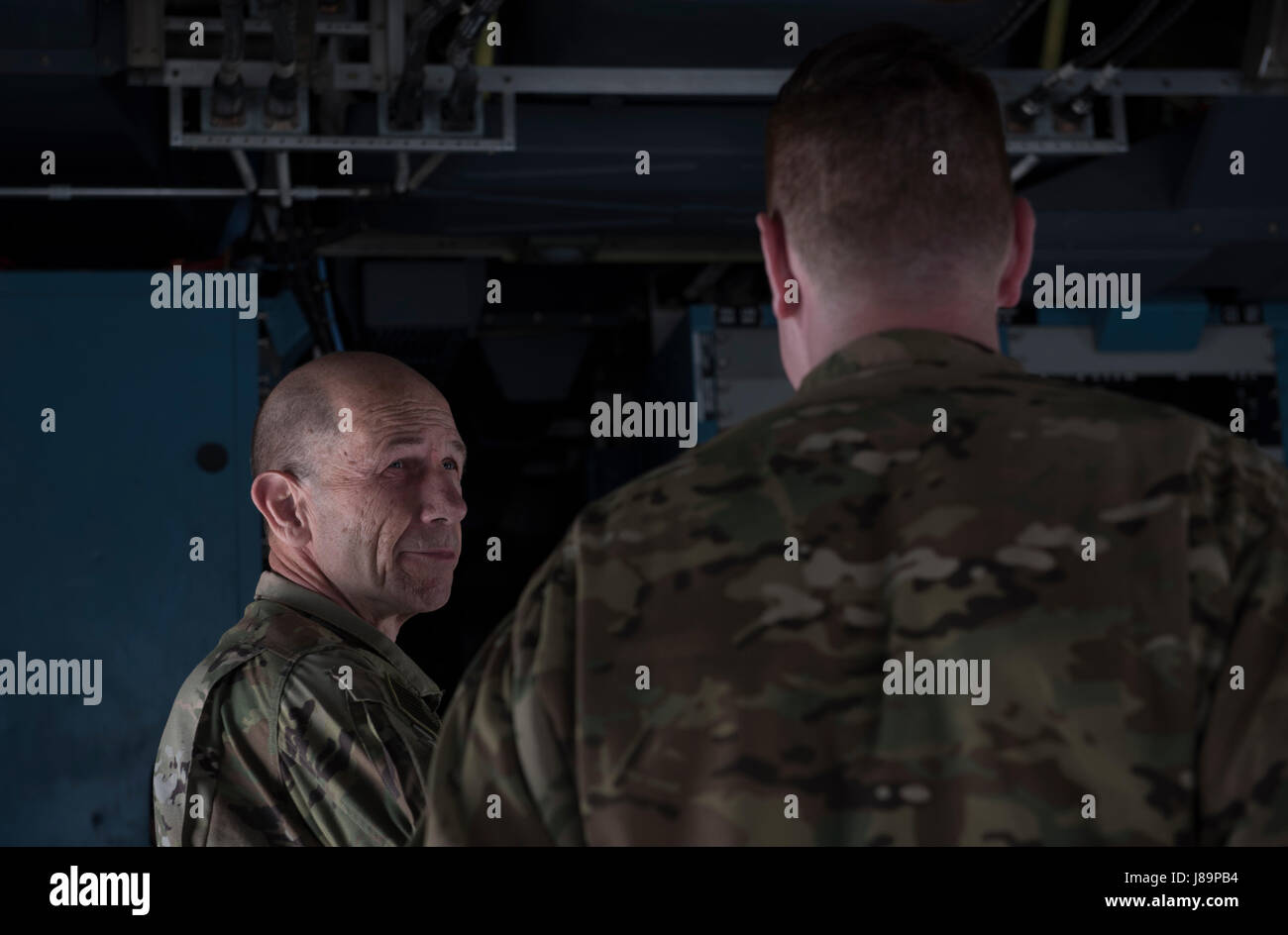 Gen. Mike Holmes, commander of Air Combat Command, speaks with Maj ...