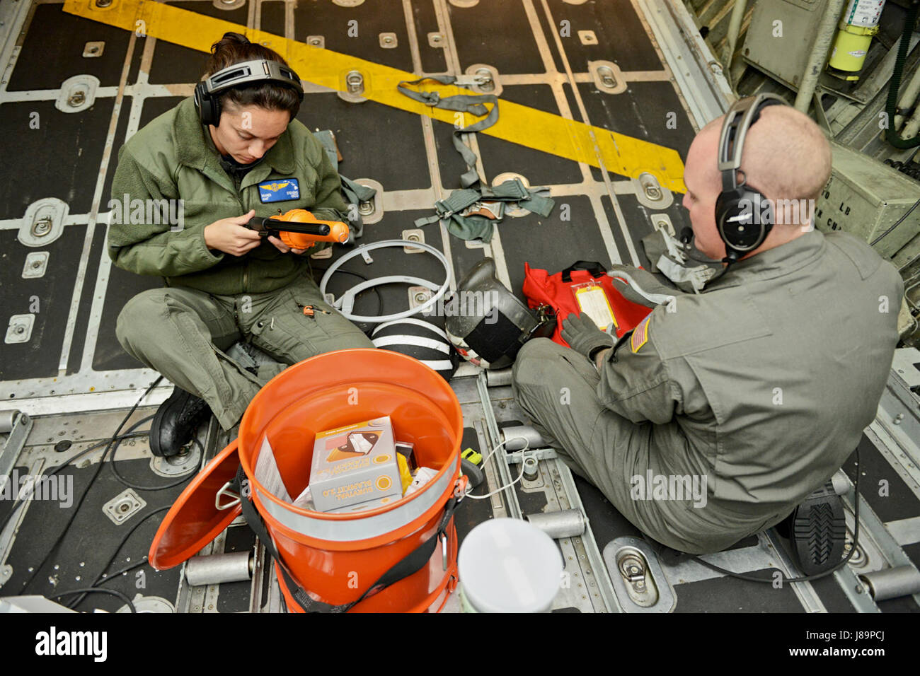 Petty Officer 2nd Class Mandi Stevens and Petty Officer 2nd Class Chris ...