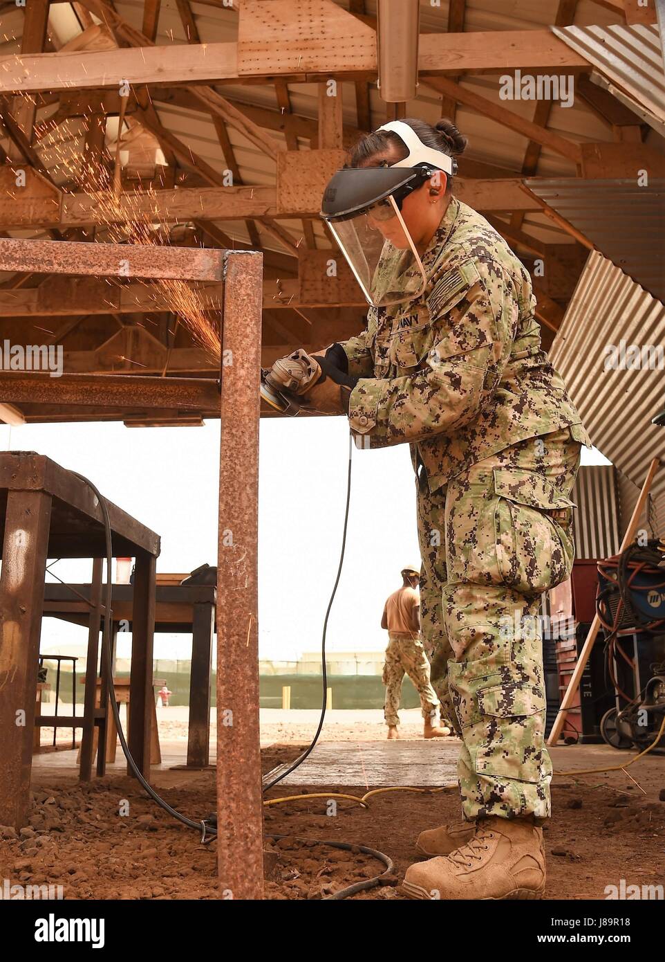 U.S. Navy Petty Officer 3rd Class Katelyn Kirkpatrick, a Naval Mobile ...