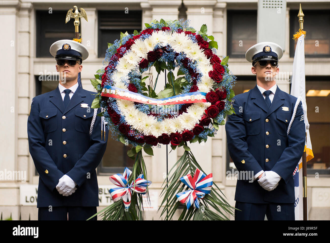 Member of the U.S. Coast Guard Silent Drill Team stand at attention at ...