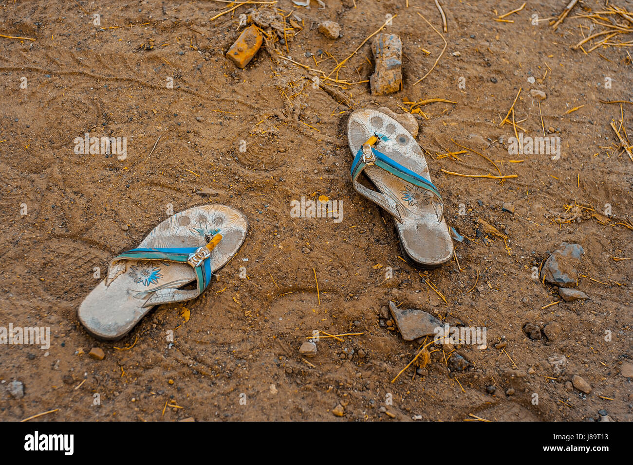 Slippers on sand Stock Photo - Alamy