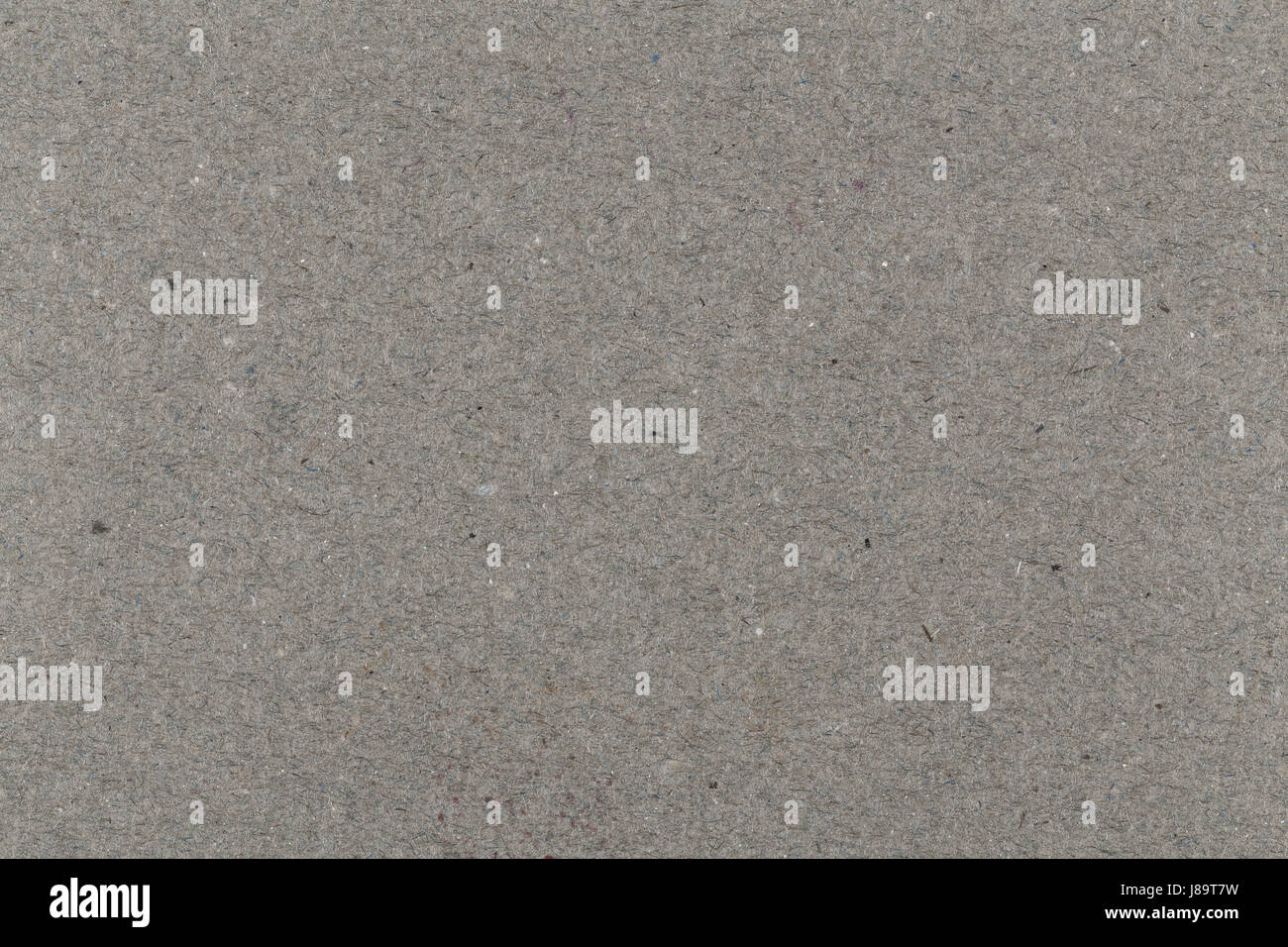Dense cardboard paper closeup texture or background Stock Photo - Alamy