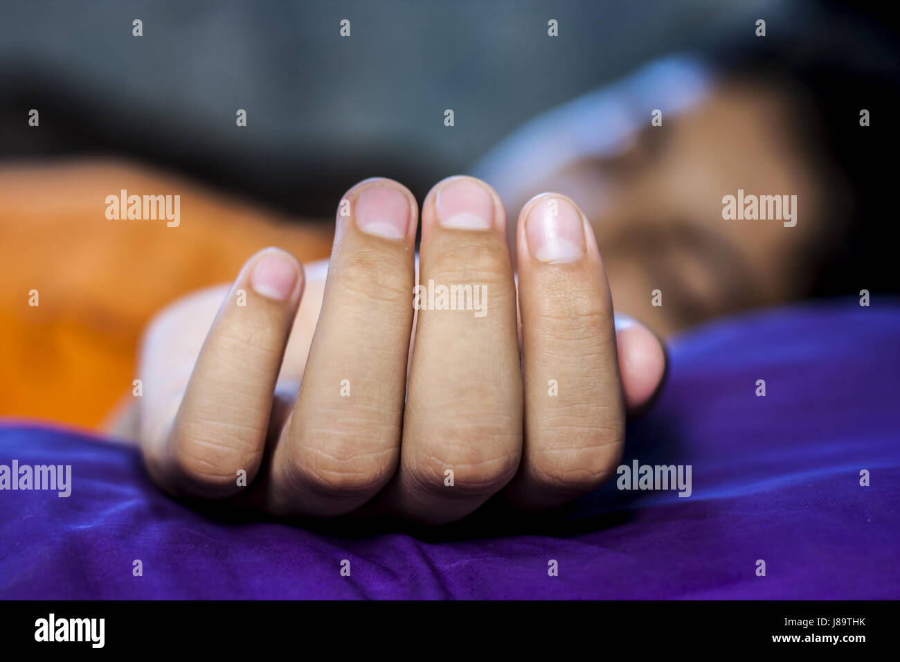 A boy's hand on a pillow Stock Photo - Alamy