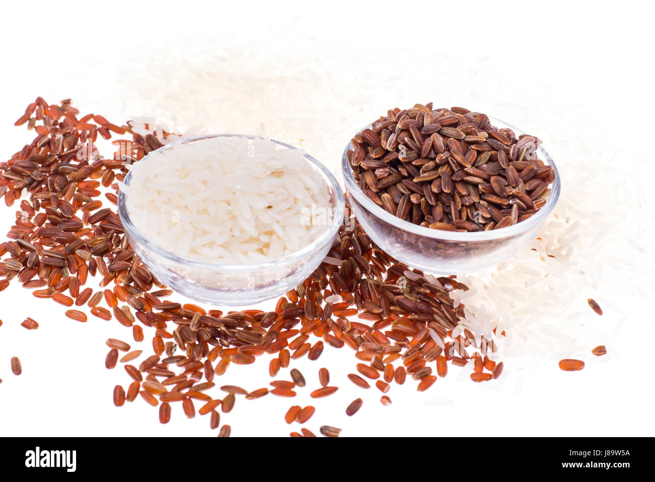 Groats of red and white rice Stock Photo - Alamy