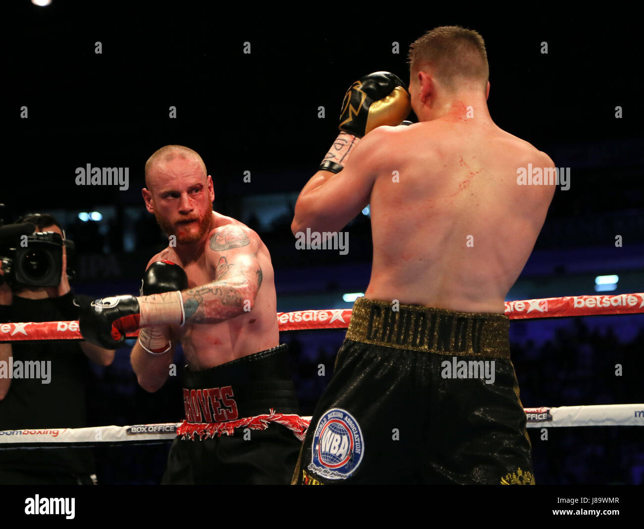 George Groves (left) in action against Fedor Chudinov during their ...