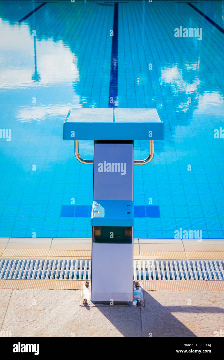 Close up of swimming pool starting block outdoors. Swimming competition ...