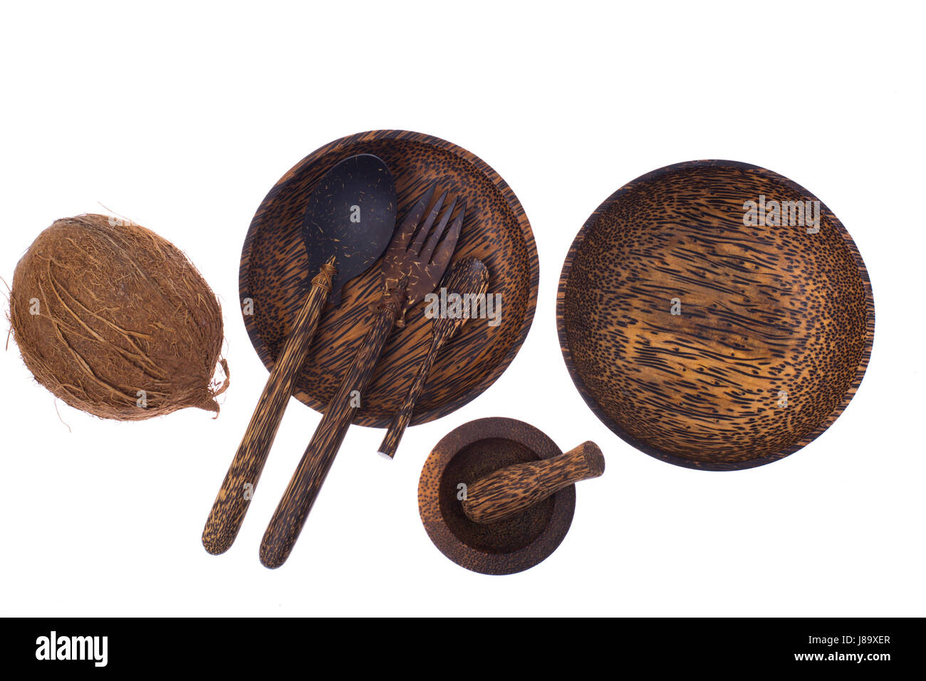 Exotic dining room wooden utensils Stock Photo - Alamy
