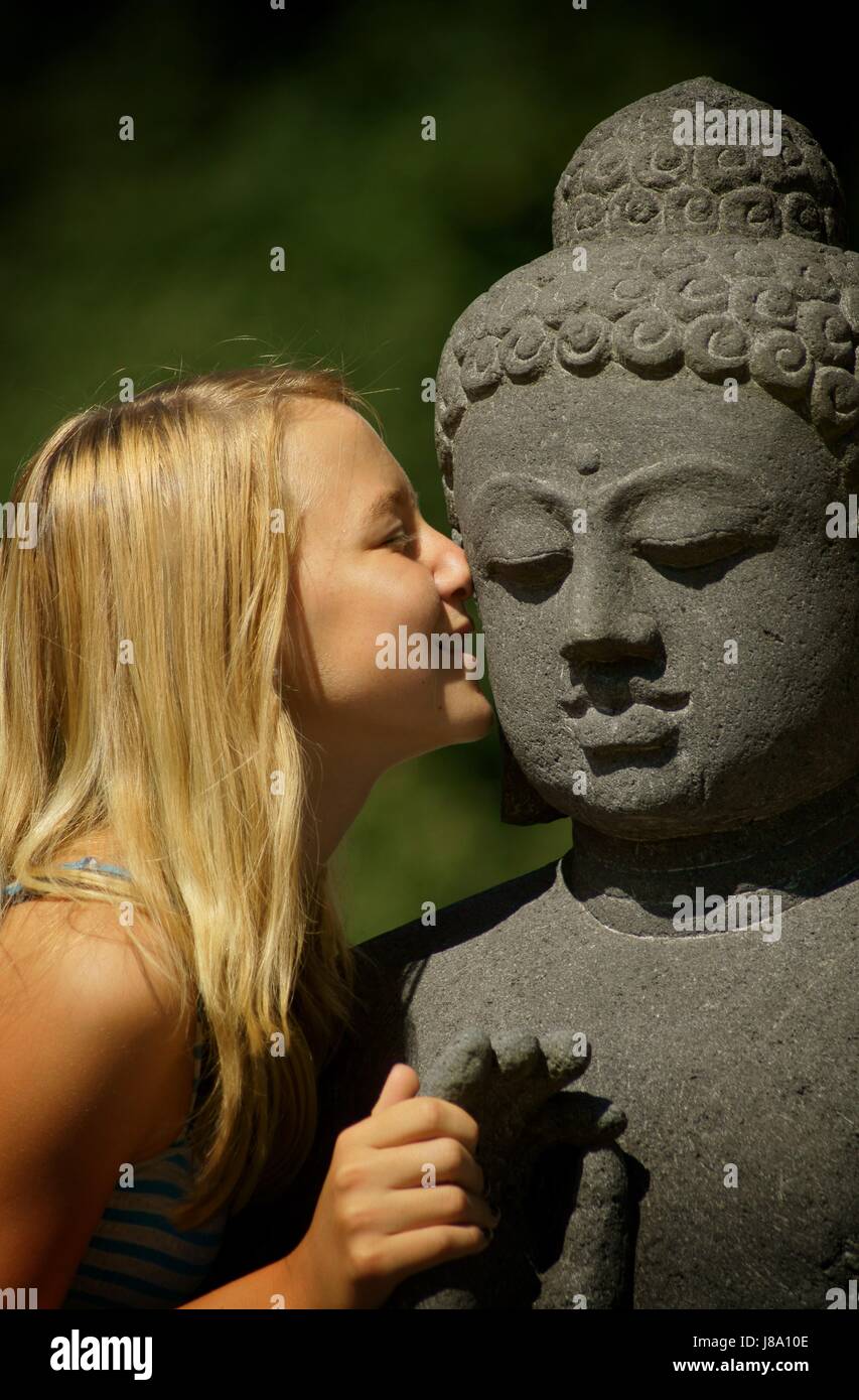 buddha with white kid Stock Photo - Alamy